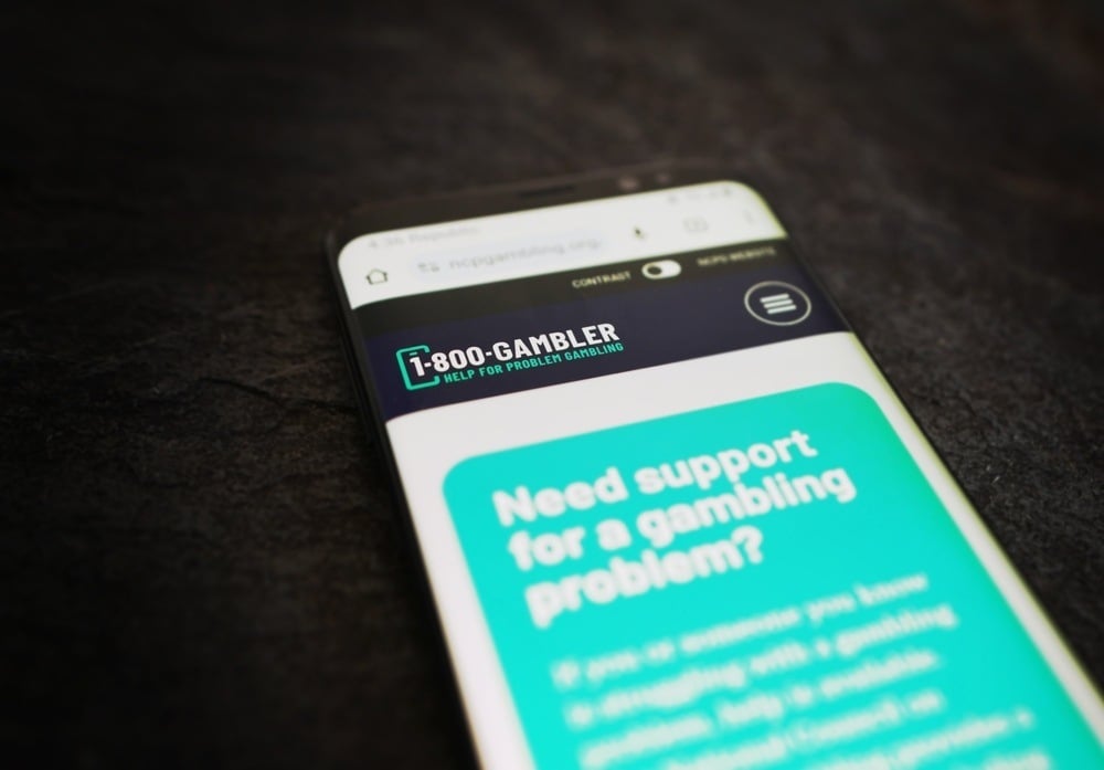 Problem Gambling Nonprofits Fight Over 1-800-GAMBLER Hotline